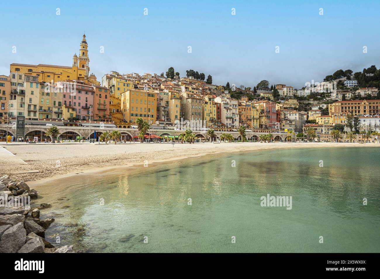 The beautiful beach of Menton with turquoise water and beautiful ...
