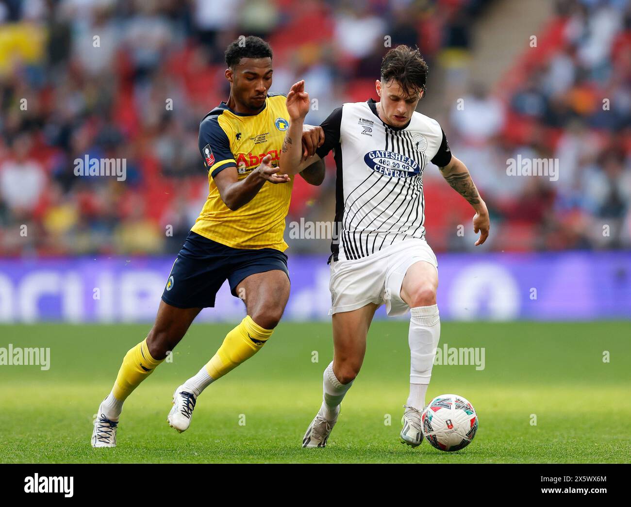 Gateshead's Tom Allan in action against Solihull Moors's Tyrese Shade ...