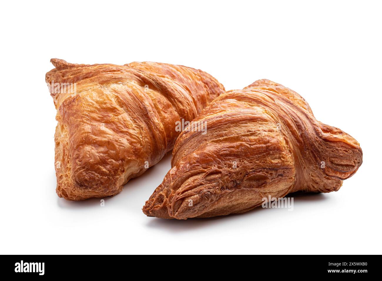 Puff pastry triangles filled with apples isolated on white background ...