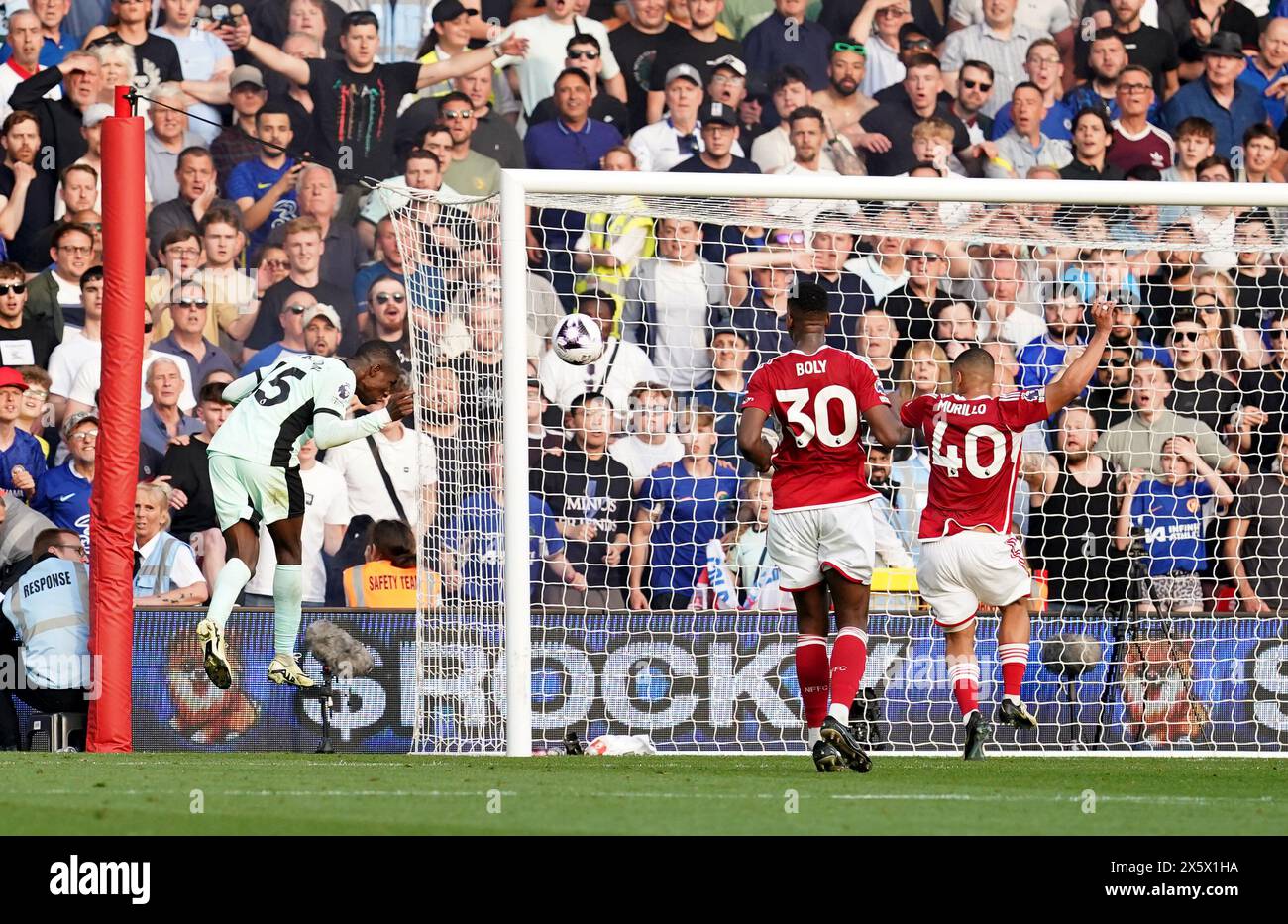 Chelsea's Nicolas Jackson (left) scores his sides third goal of the ...