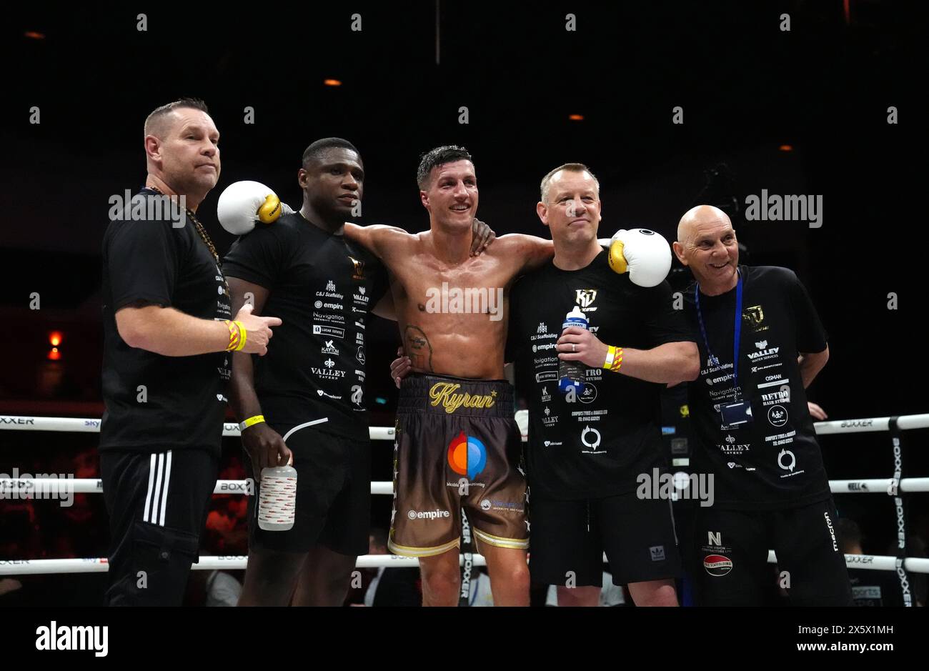 Kyran Jones (centre) celebrates victory against Lewis Howells (not ...