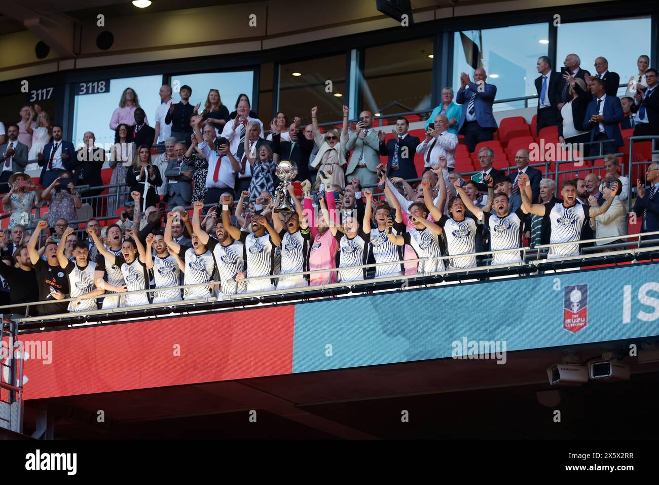 Gateshead celebrate as they lift the trophy after victory in the Isuzu ...
