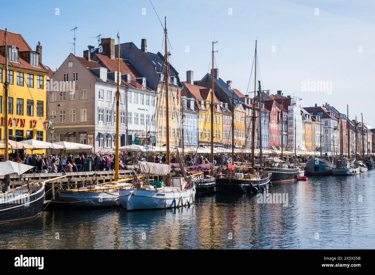 Copenhagen, Denmark - April 6, 2024: Crowded Nyhavn waterfront, canal ...