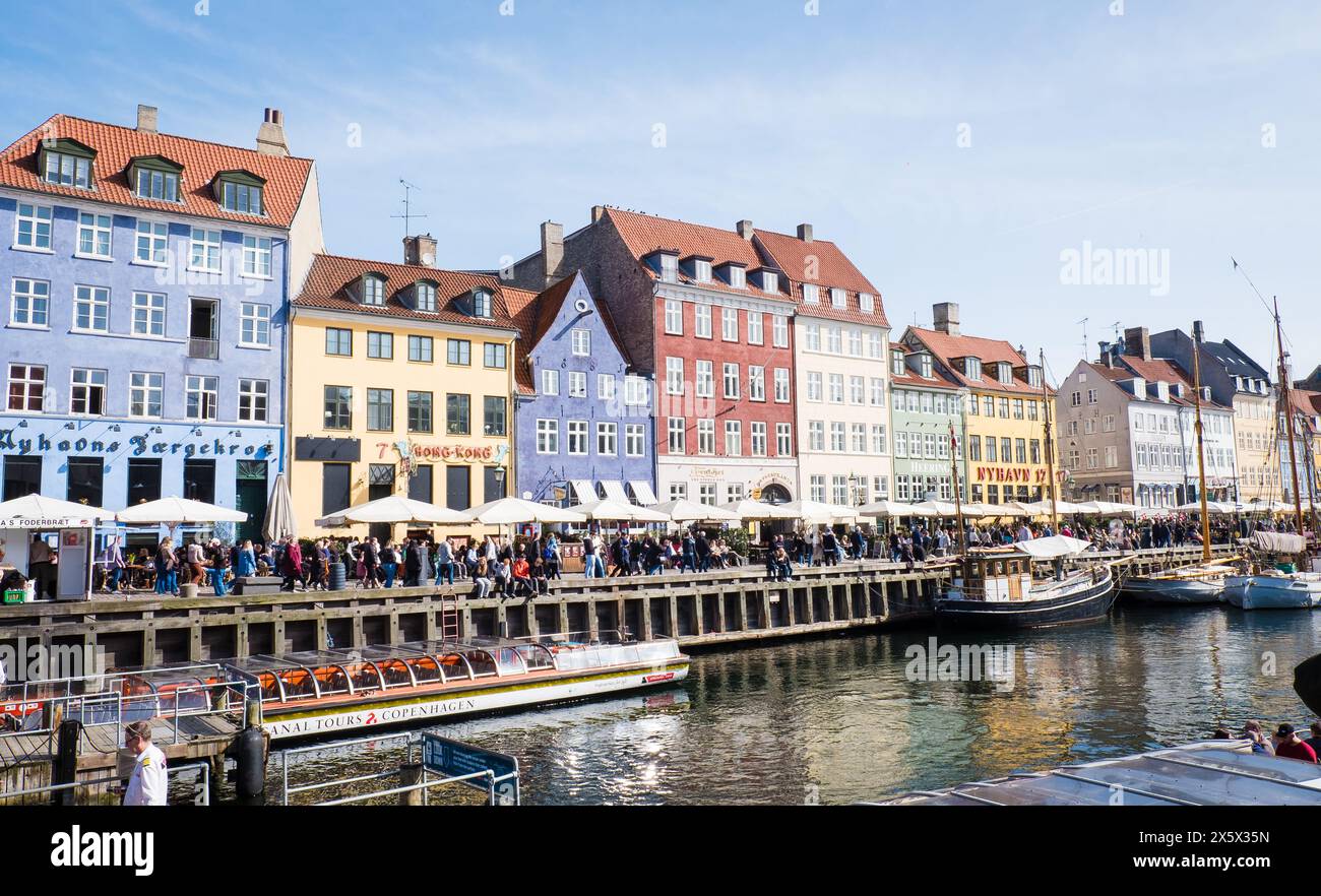 Copenhagen, Denmark - April 6, 2024: Crowded Nyhavn waterfront, canal ...