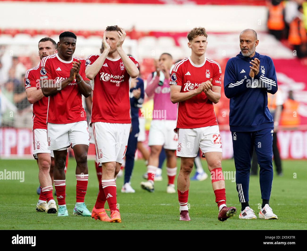 Nottingham Forest manager Nuno Espirito Santo (right) walks around the ...