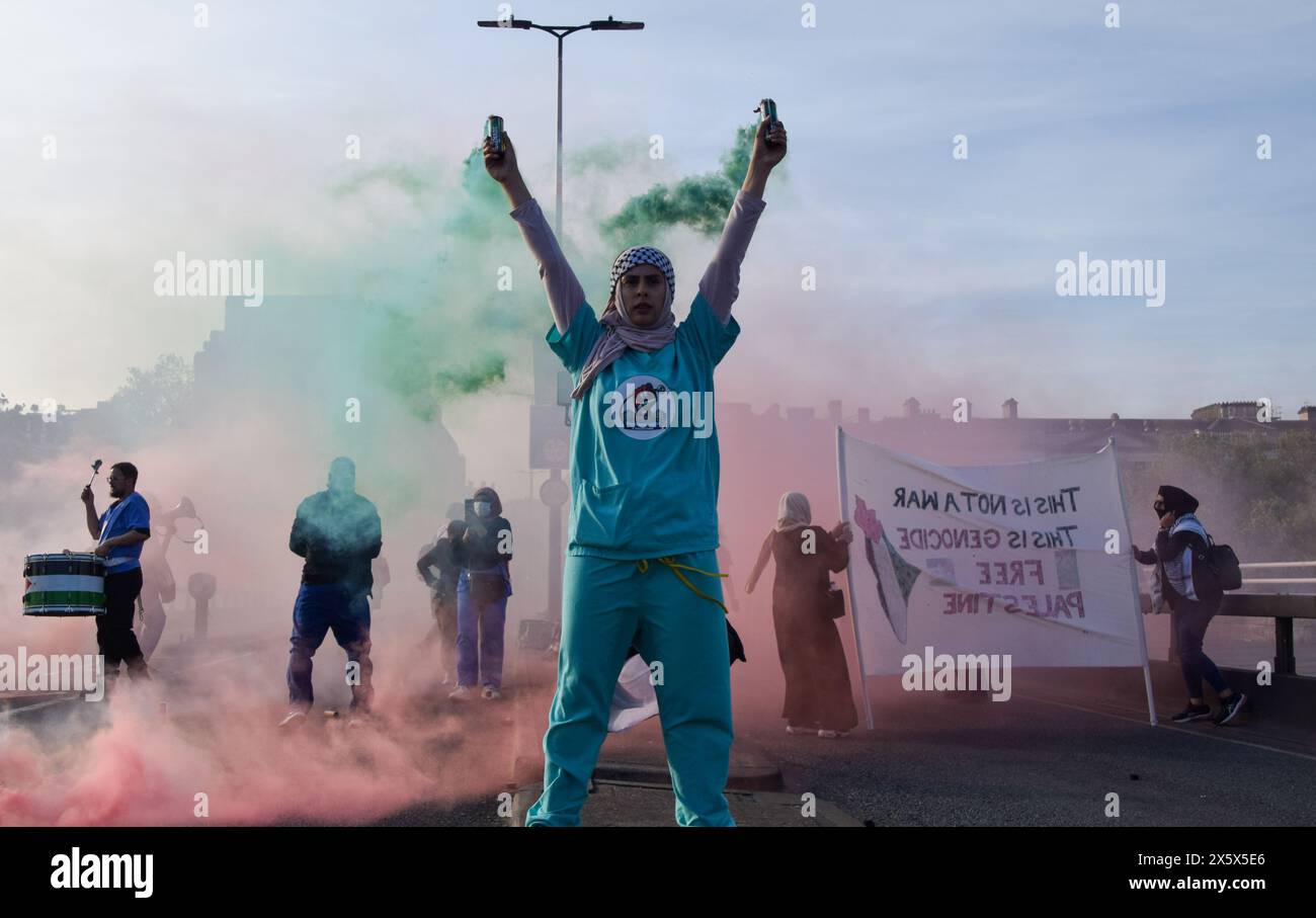 London, UK. 11th May 2024. Pro-Palestine protesters set off smoke ...
