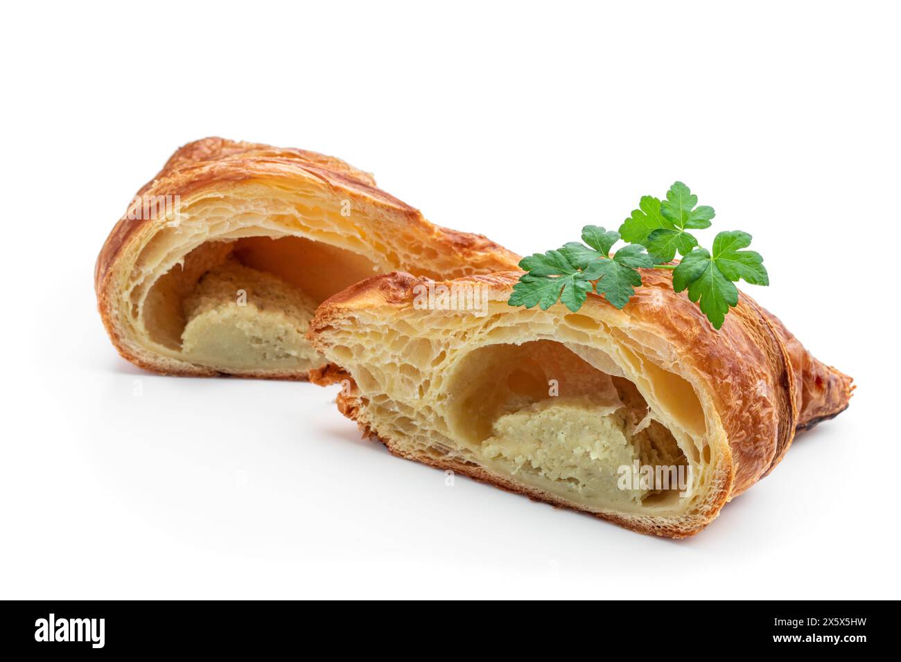 Puff pastry triangles with vegetables fillings isolated on white ...