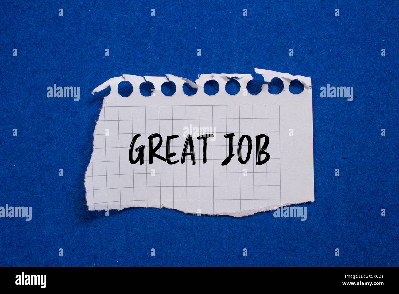 Great job written on ripped white paper with blue background ...