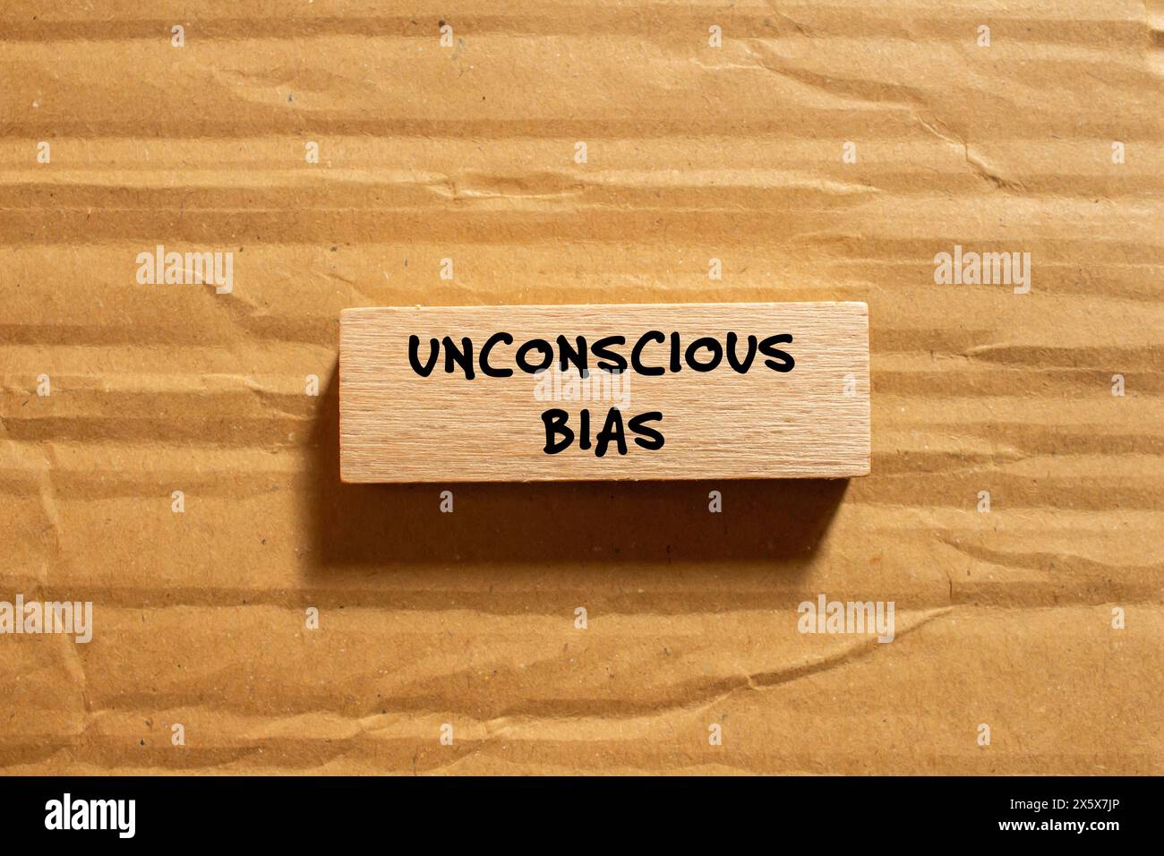 Unconscious Bias Words Written On Wooden Block With Cardboard Background Conceptual Unconscious