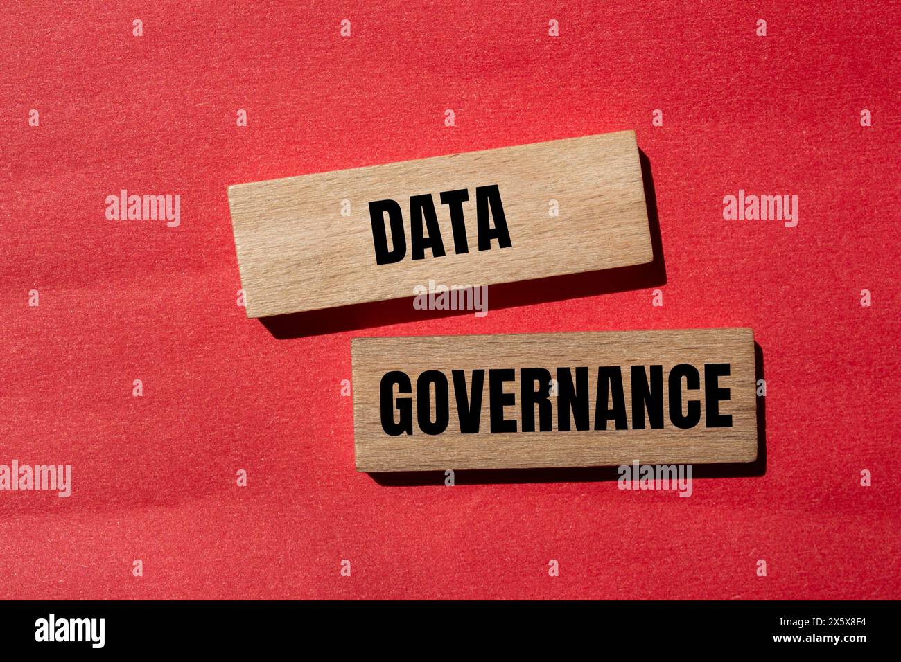 Data governance words written on wooden blocks with red background ...