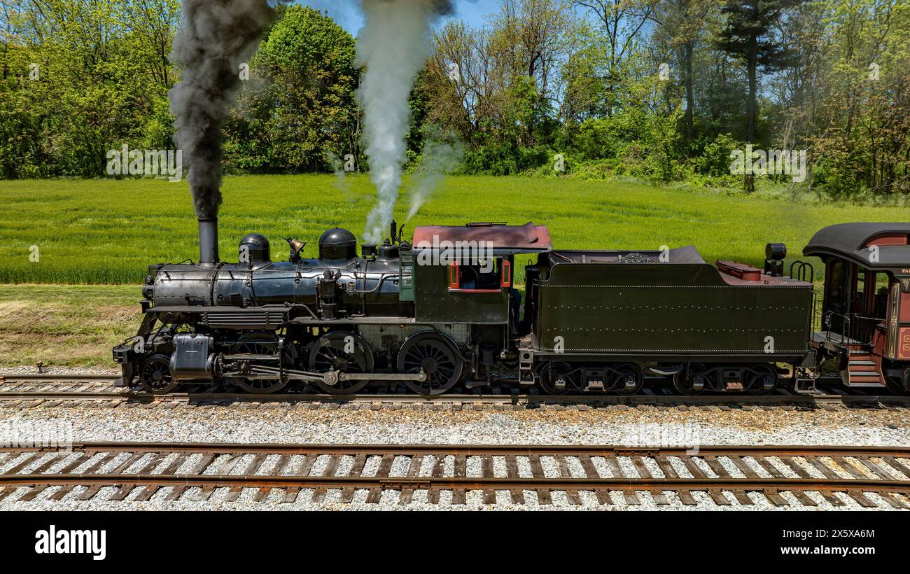 A detailed close-up image of a vintage steam locomotive, Number 89 ...