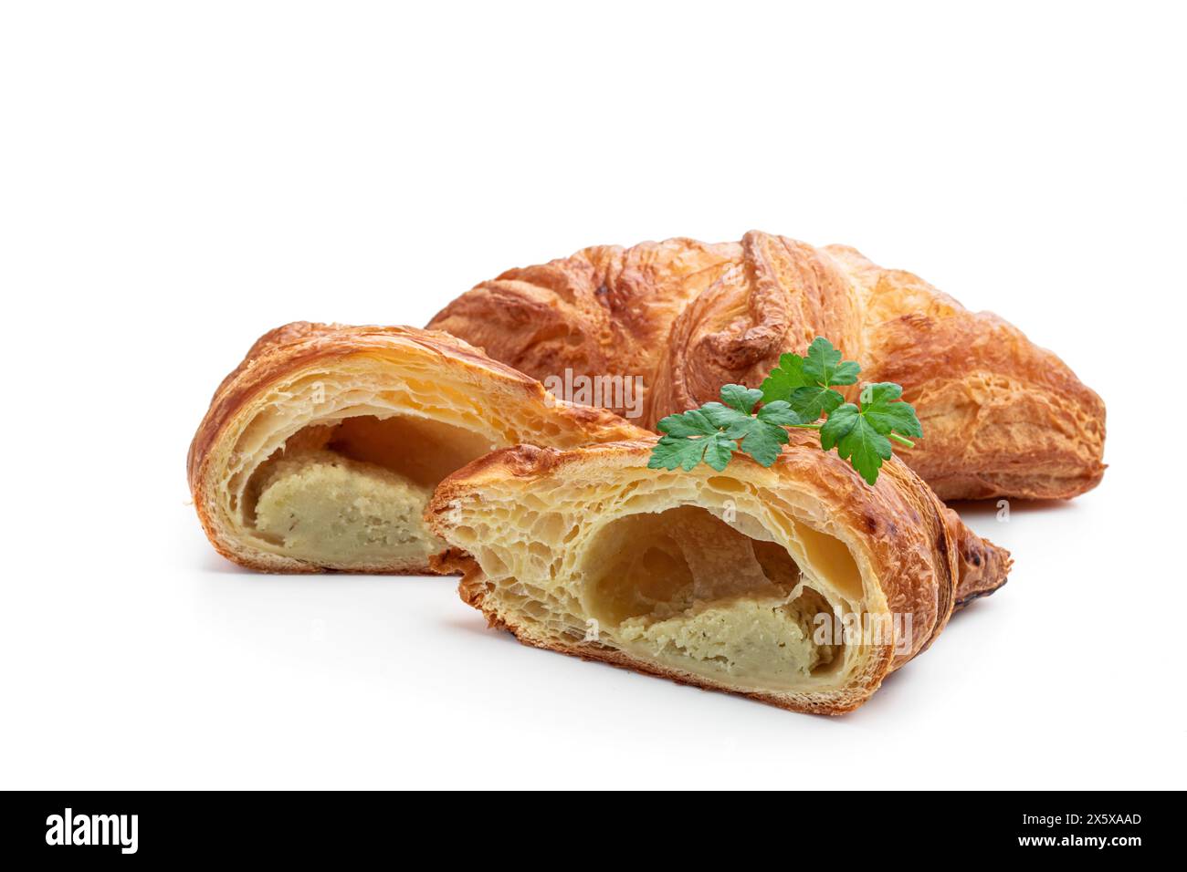 Puff pastry triangles with vegetables fillings isolated on white ...