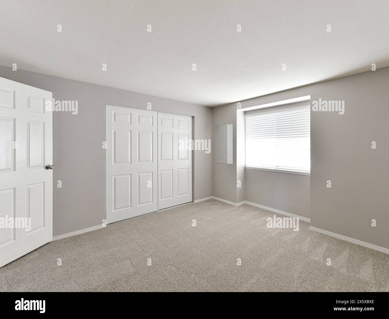 Modern residential empty bedroom interior Stock Photo - Alamy