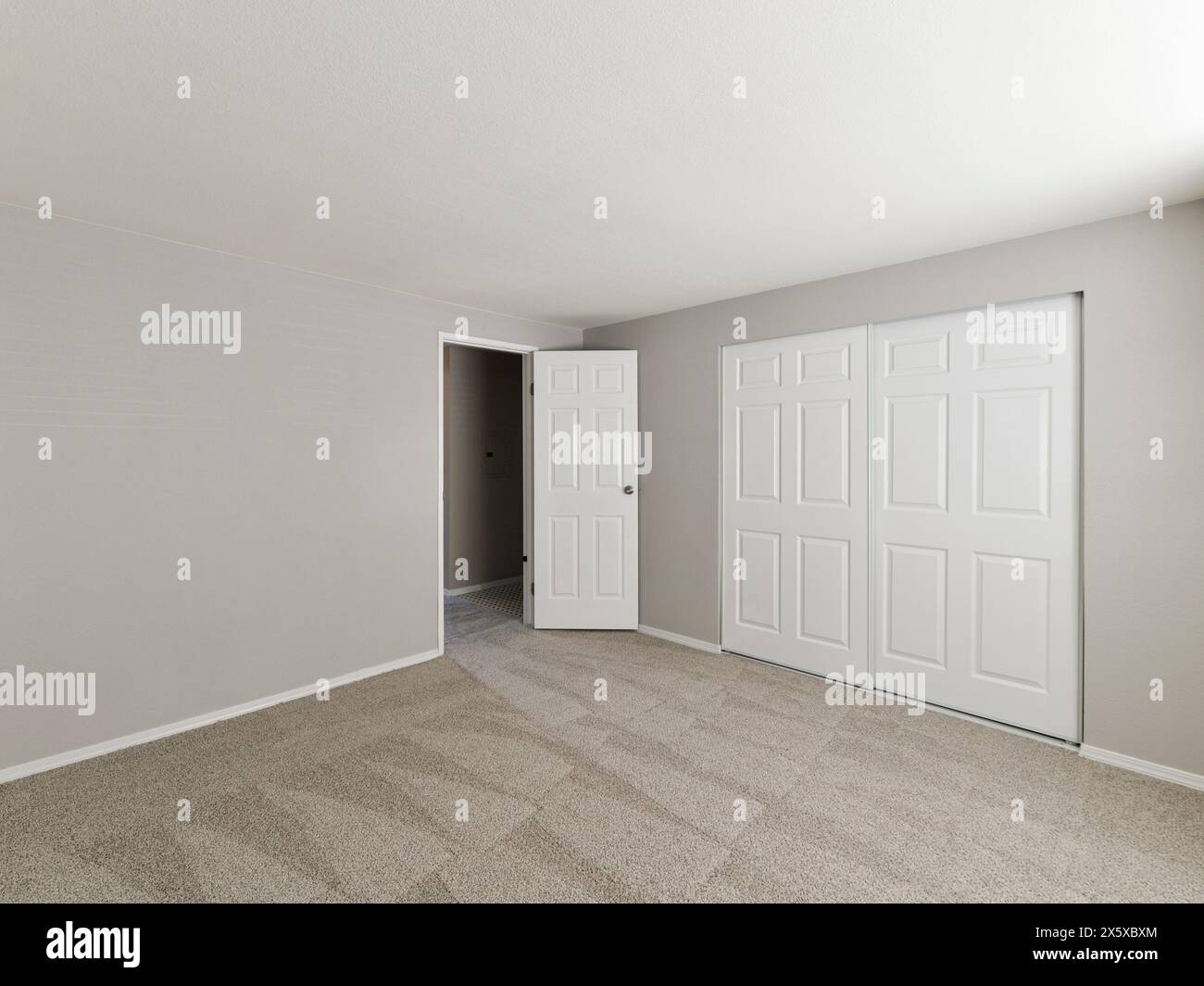 Modern residential empty bedroom interior Stock Photo - Alamy