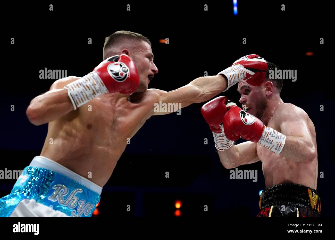 Rhys Edwards (left) and Thomas Patrick Ward in the feather weight bout ...