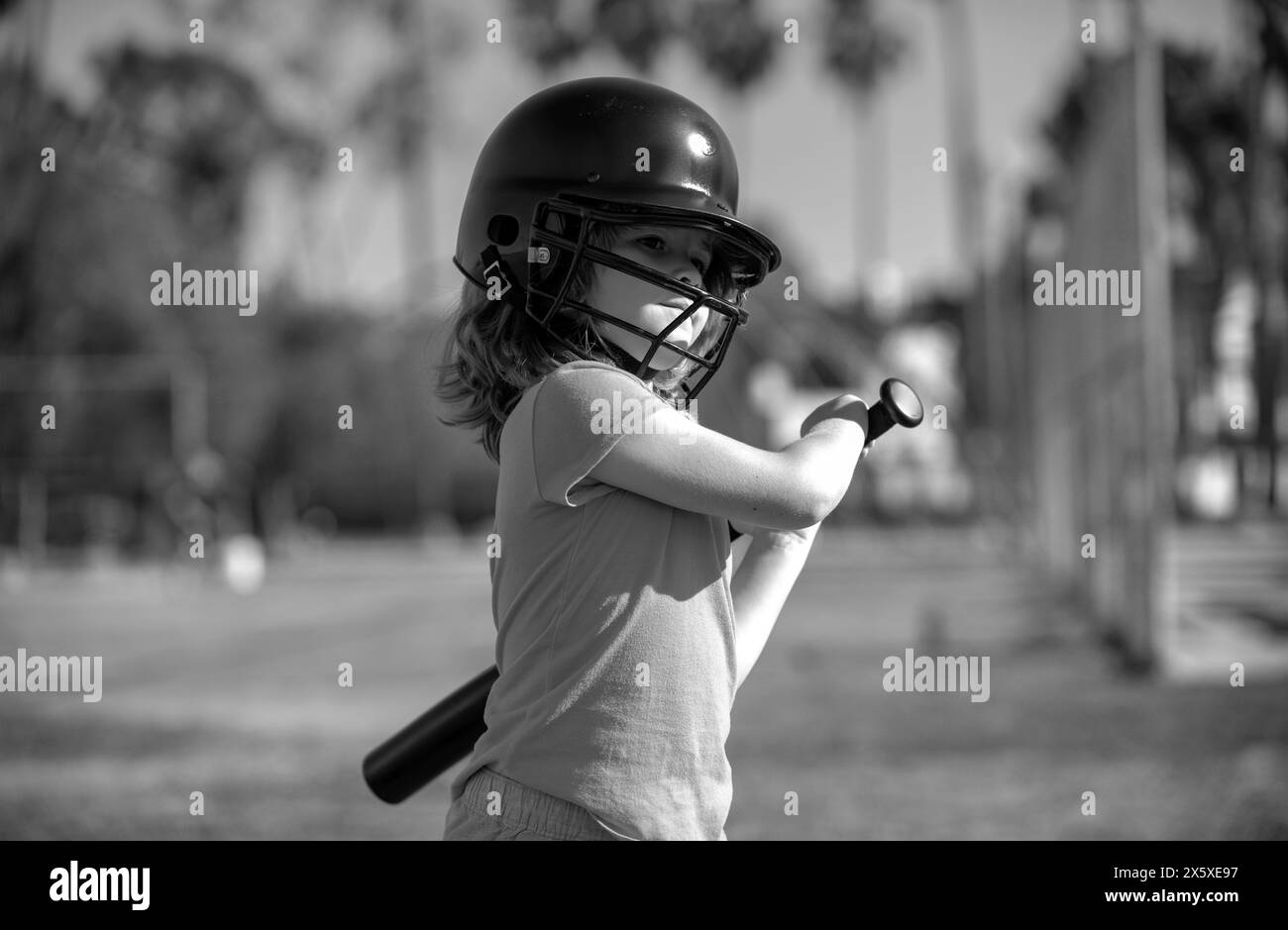 Boy kid holding a baseball bat. Pitcher child about to throw in youth ...