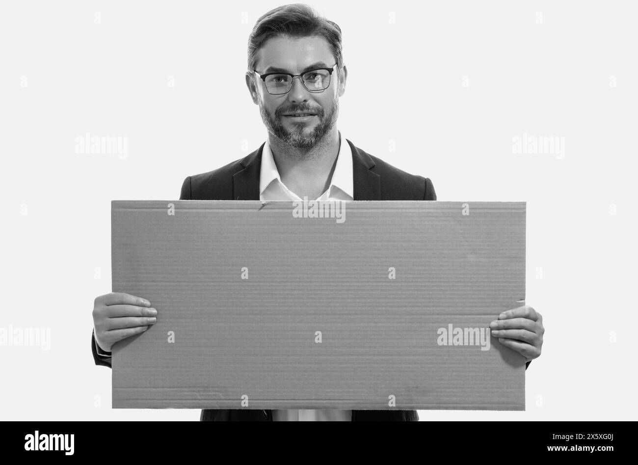 Handsome man holds the sign, blank card. Placard ready for your product ...