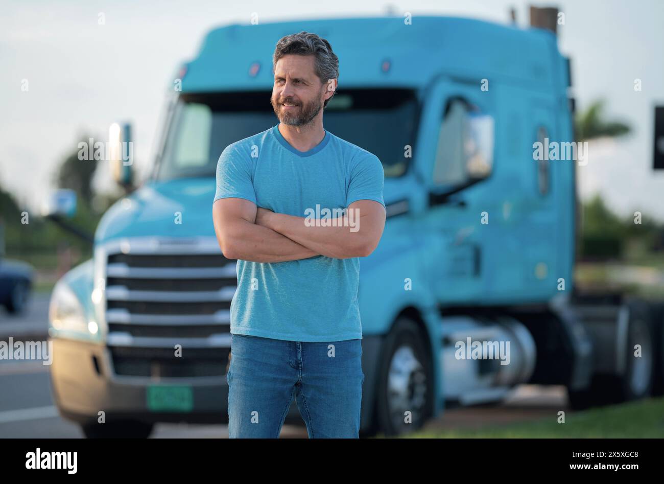 Men driver near lorry truck. Man owner truck . Serious middle aged man trucker trucking owner ...