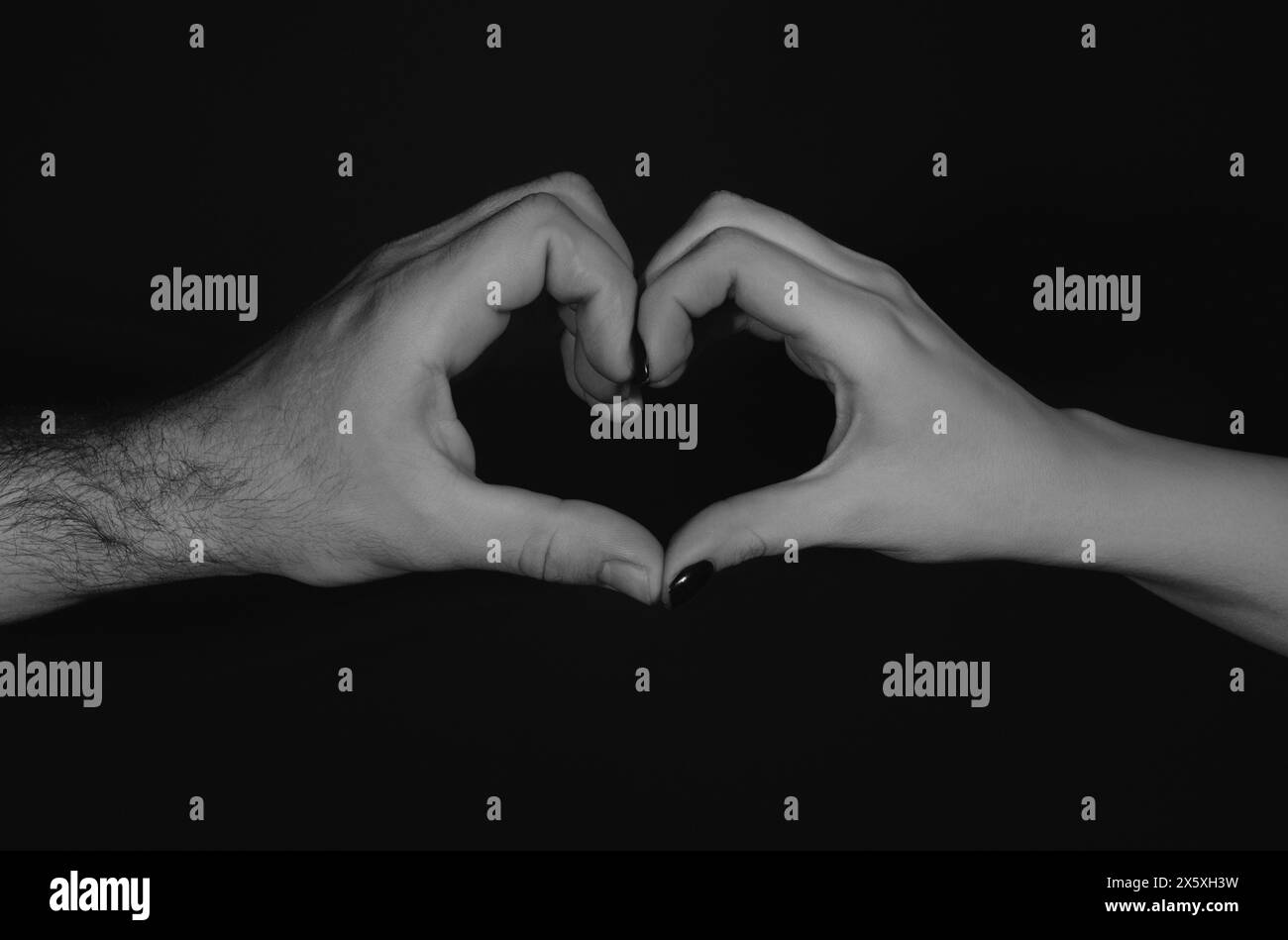 Female and male hands in form of heart. Hands in shape of love heart ...