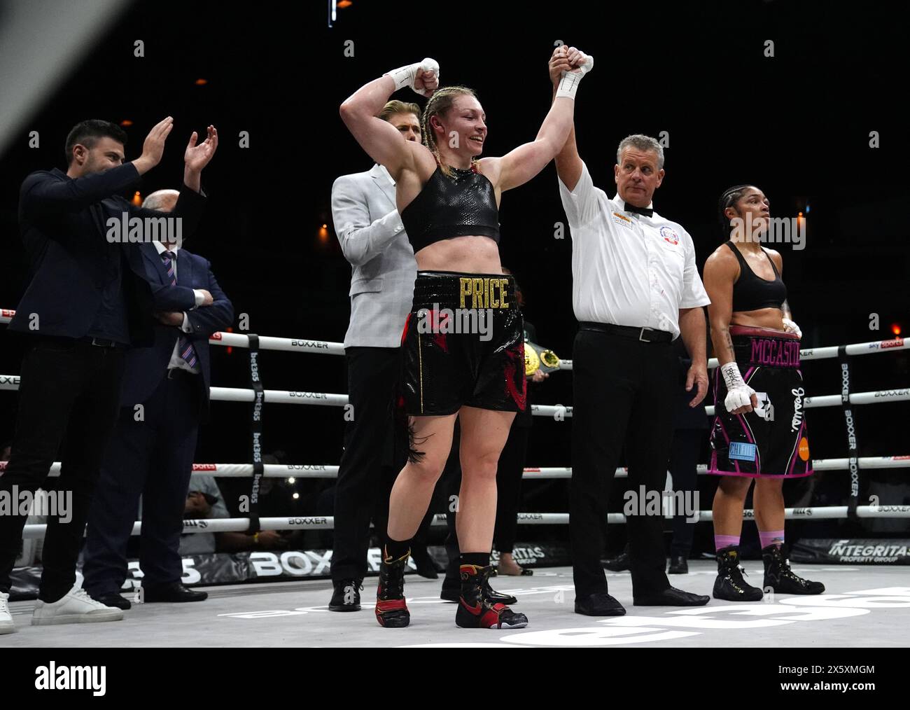 Lauren Price (left) celebrates victory against Jessica McCaskill ...