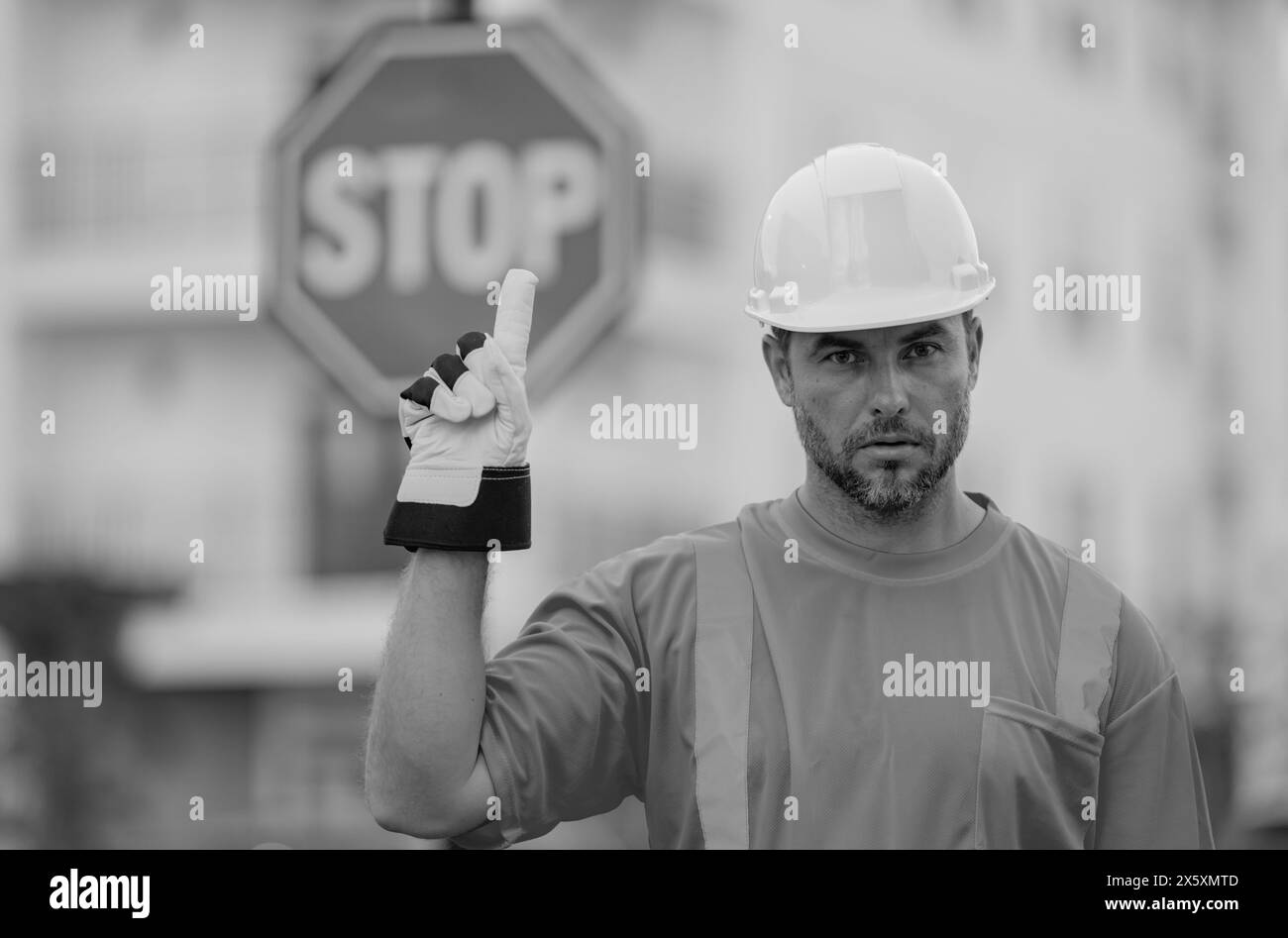 Stop road sign. Builder with stop gesture, no hand, dangerous on ...