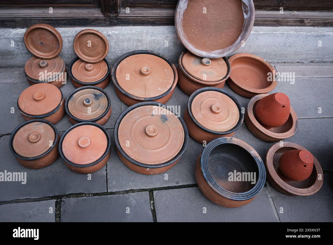 Mediterranean-Style Terracotta Pots on a Sidewalk Stock Photo - Alamy