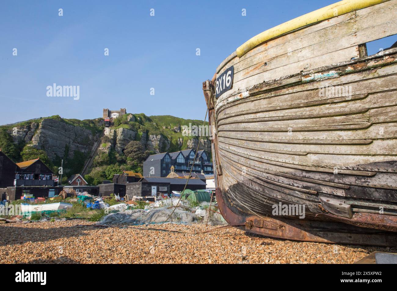 Hastings Fishing port, old boat and cliff railway Stock Photo - Alamy