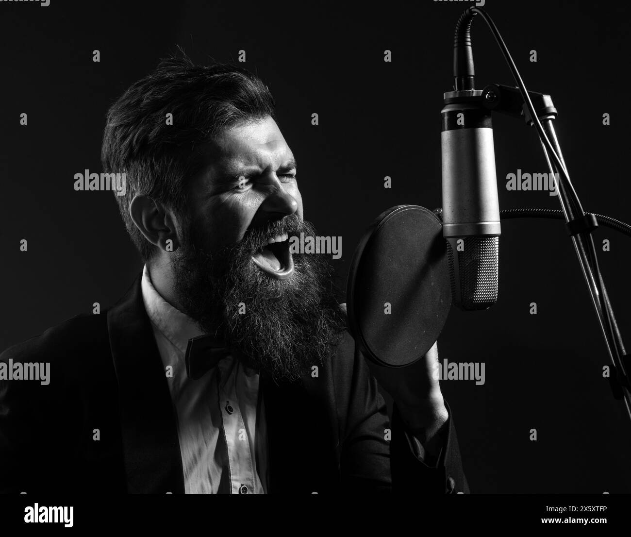 Classical music. Man singing song. Musician in music hall. Funny guy ...