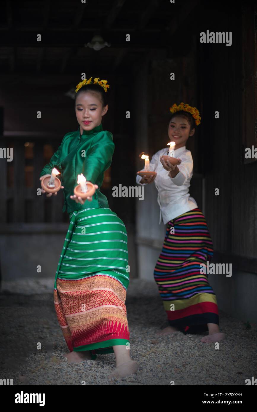 THAILAND - CHIANG-MAI, 11 MAY 2024 : A teacher is teaching Thai dance ...