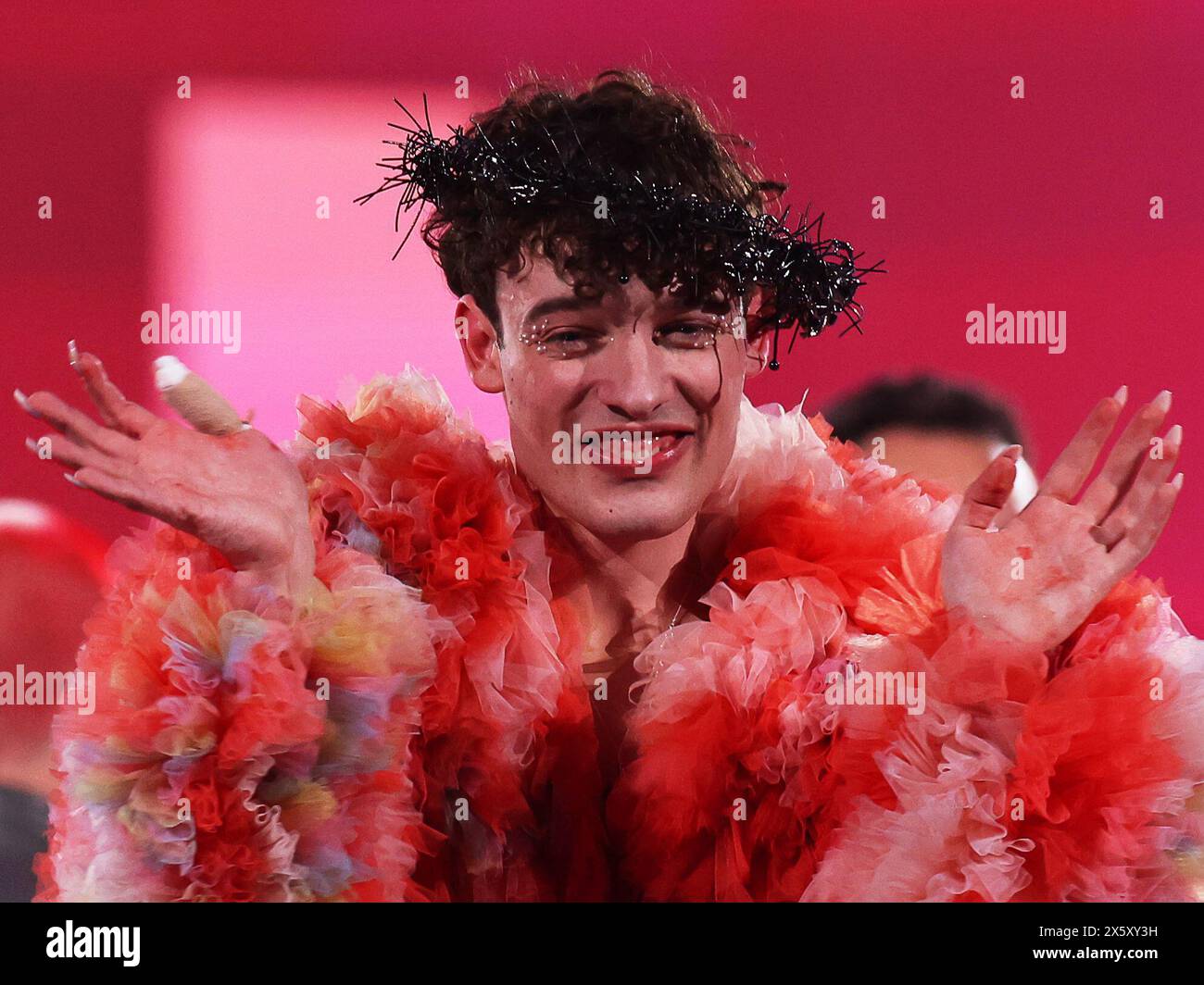 Malmo, Sweden. 12th May, 2024. Nemo from Switzerland reacts after ...