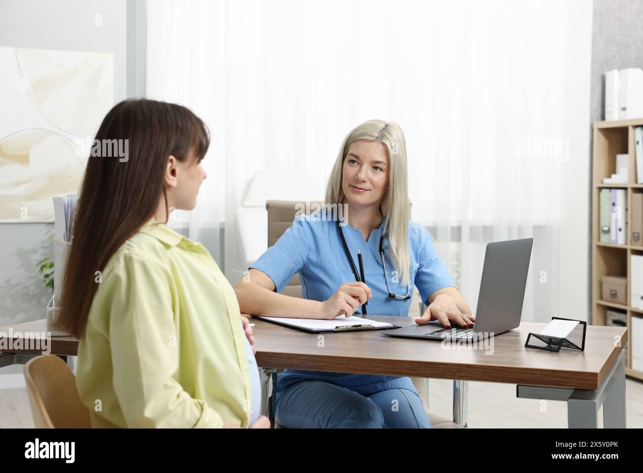 Nurse visit pregnant mother hi-res stock photography and images - Alamy