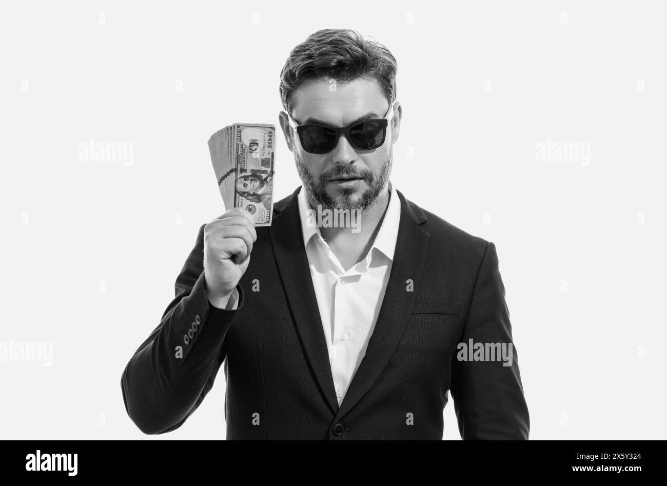 Man in suit holding cash money in dollar banknotes on isolated white ...