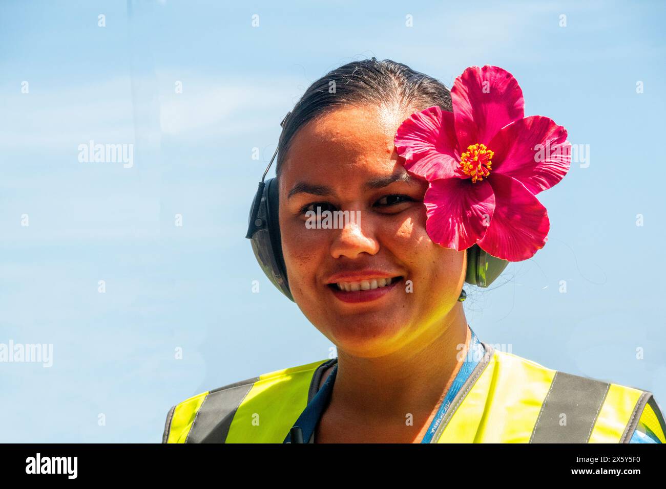 Wearing flower behind ear hi-res stock photography and images - Alamy