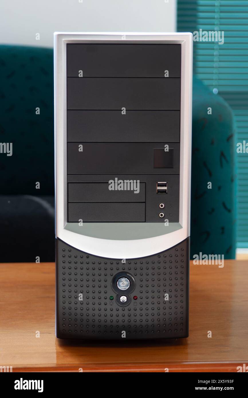 black computer tower case on a table in a room Stock Photo - Alamy