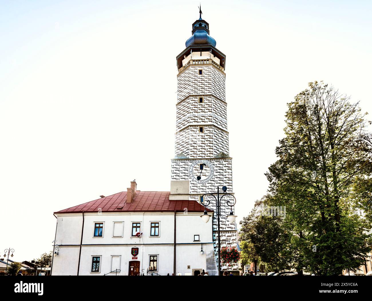 Decorated with geometric patterns, the ancient tower of the town hall ...