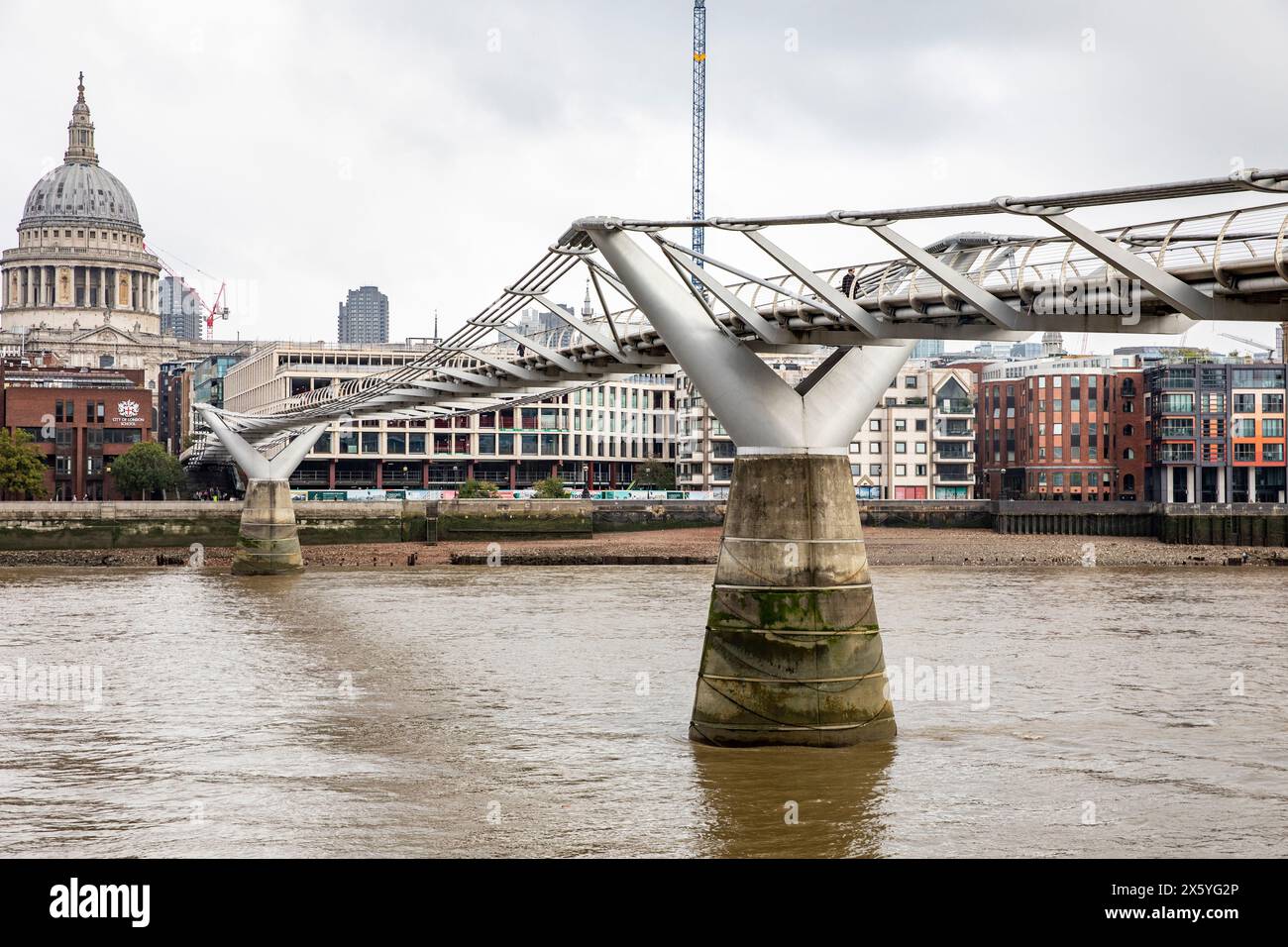 London, Millennium footbridge bridge across the River Thames with St ...