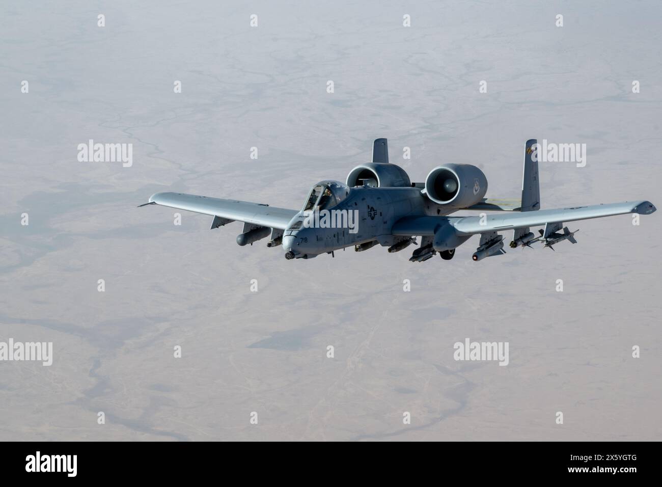 A U.S. Air Force A-10 Thunderbolt II flies behind a KC-135 Stratotanker ...