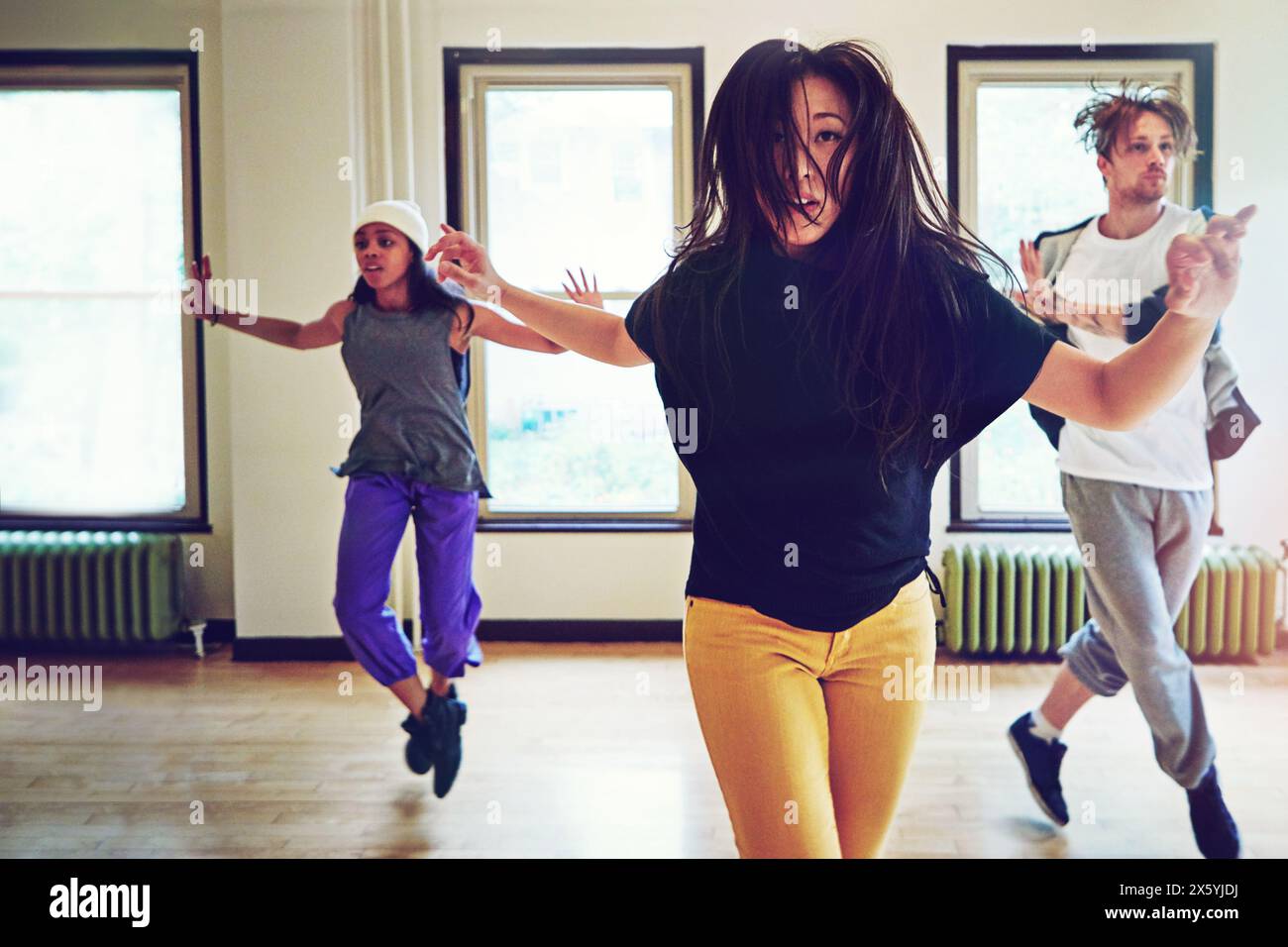 Indoor, hip hop and group of dancers for action, breakdance or ...