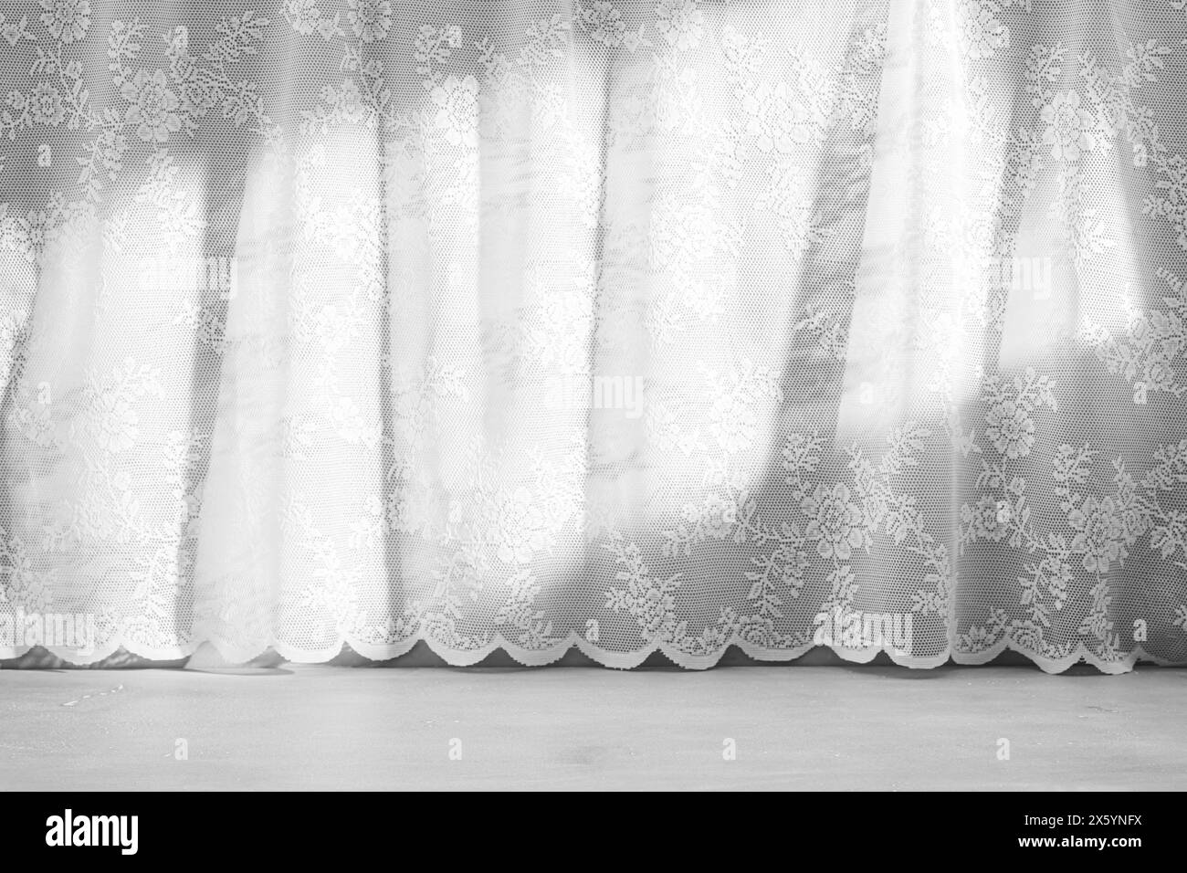 Elegant White Lace Curtains Draping Gently in a Serene Indoor Setting ...