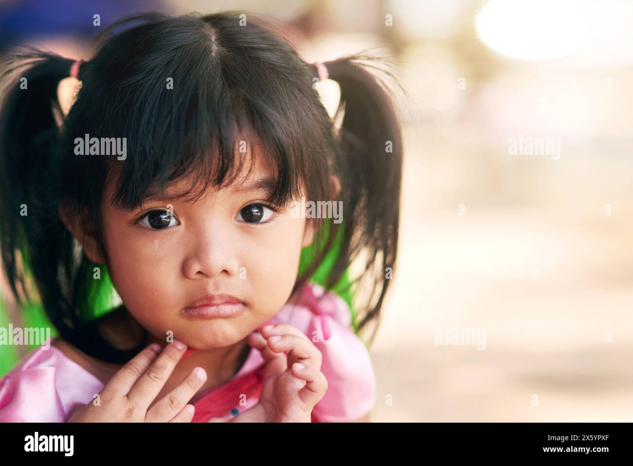 Portrait, outdoor and girl with sunshine, kid and facial with weekend ...