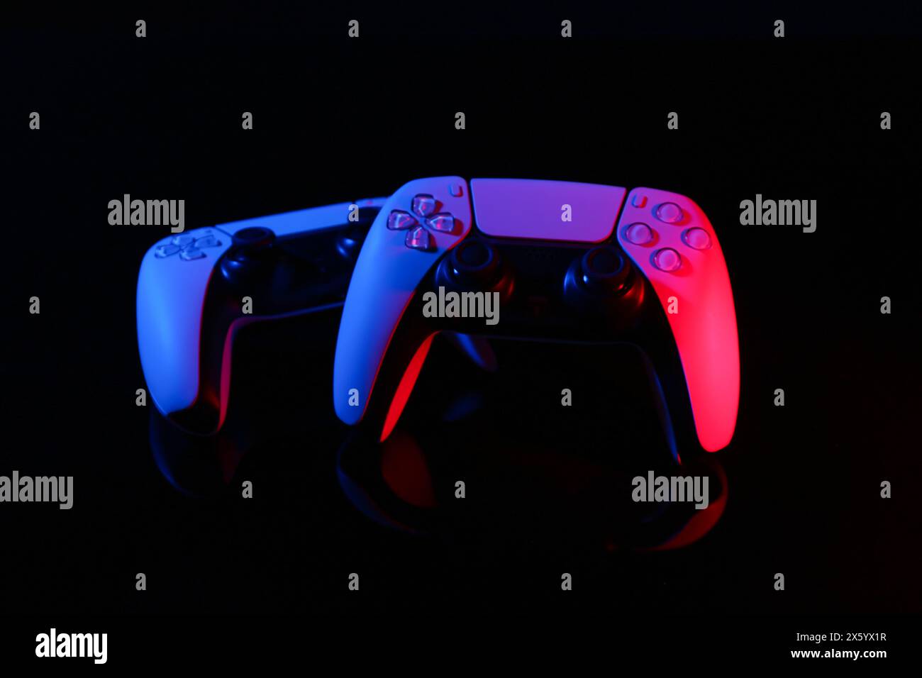 Electronic videogame console controllers hi-res stock photography and ...