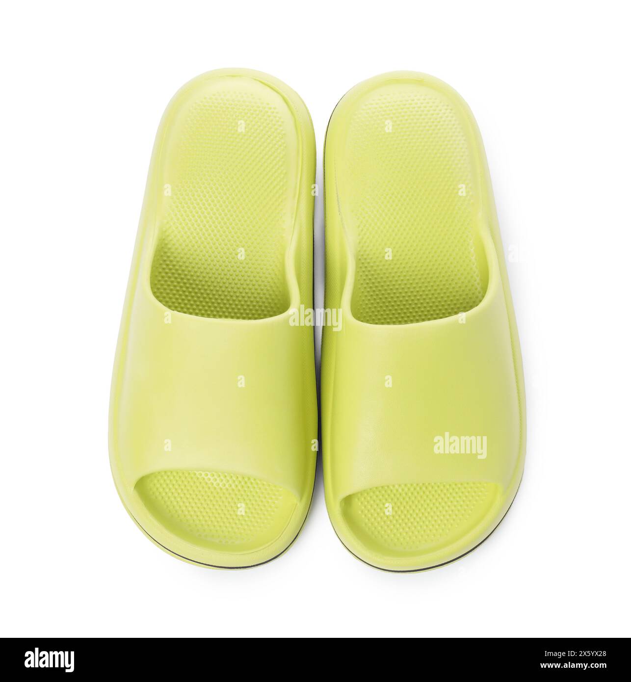 Pair of green rubber slippers isolated on white, top view Stock Photo ...