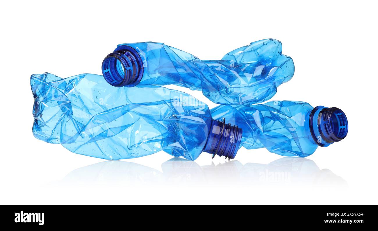 Crumpled disposable plastic bottles isolated on white Stock Photo - Alamy