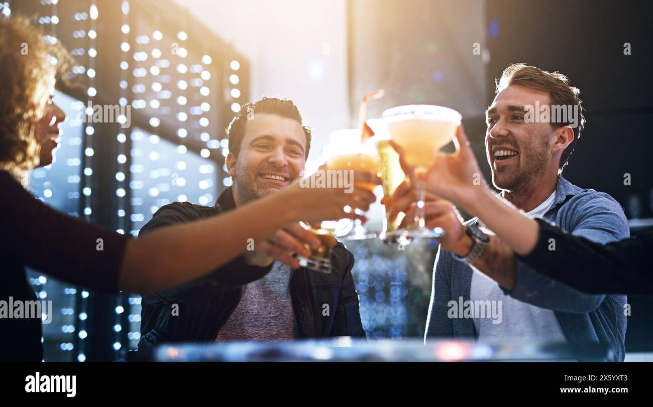 Crowd raising drink glasses hi-res stock photography and images - Alamy