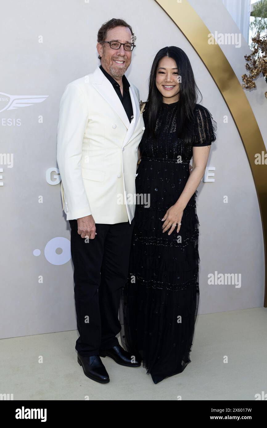 Rob Minkoff and Crystal Kung Minkoff attend the arrivals of the 2024 ...