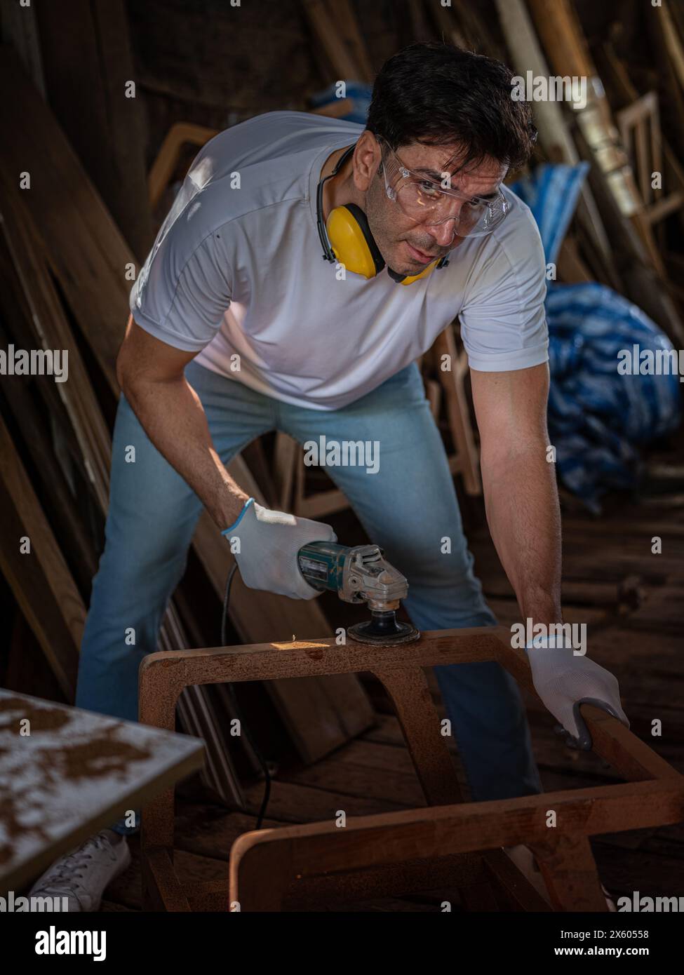 Professional Carpenter happy working to making woodcraft furniture in ...