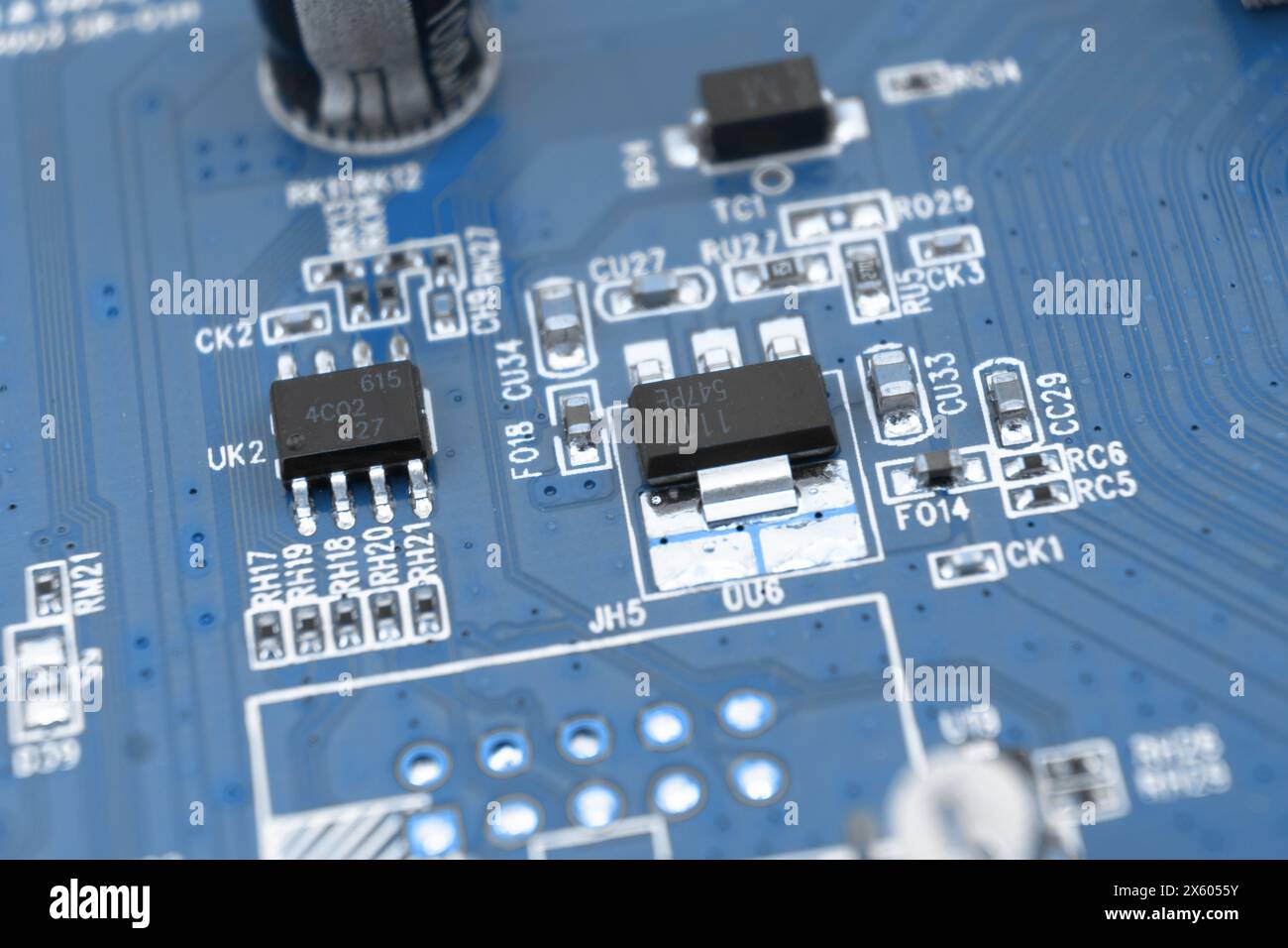 Macro shot of Circuit board with resistors microchips and electronic ...