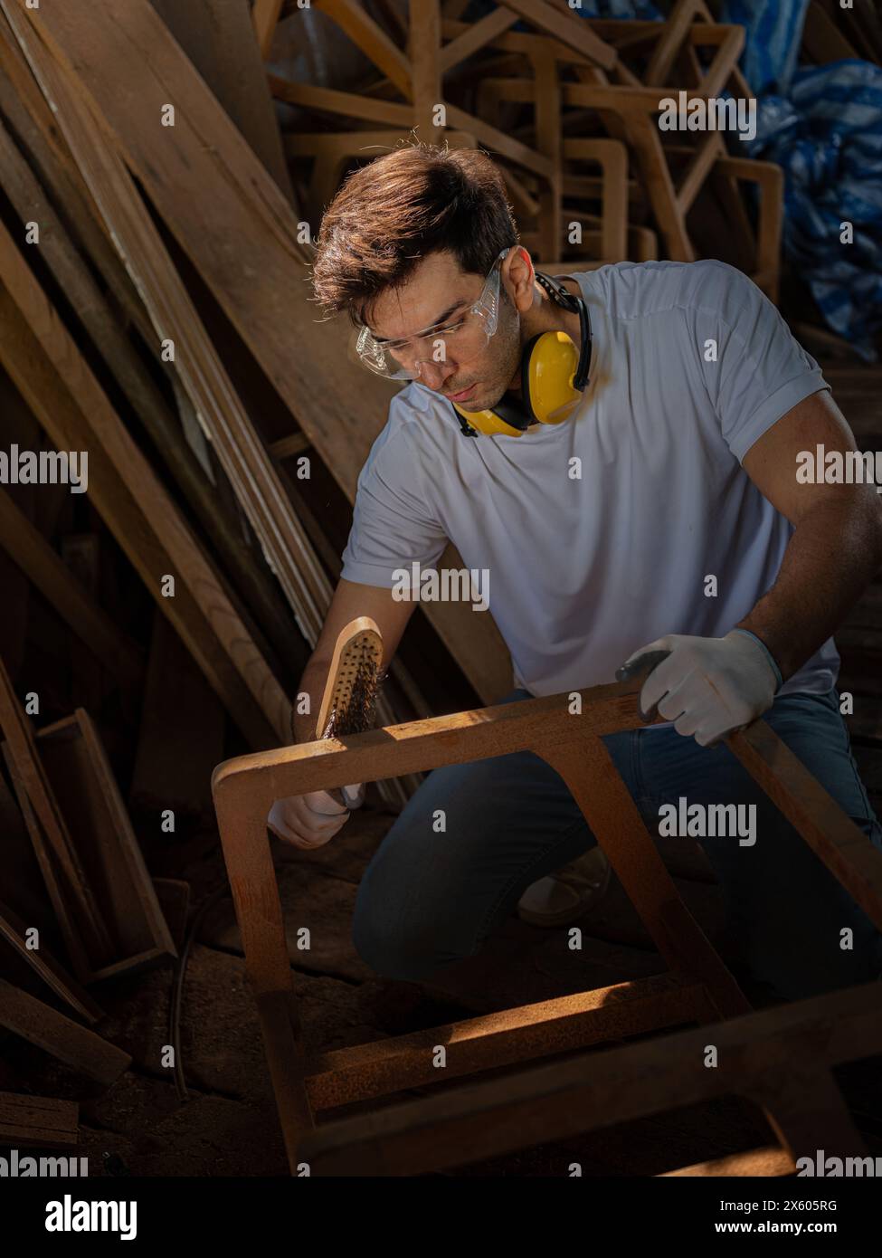 Professional Carpenter happy working to making woodcraft furniture in ...