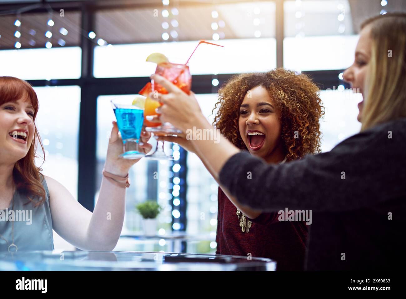 Crowd raising drink glasses hi-res stock photography and images - Alamy
