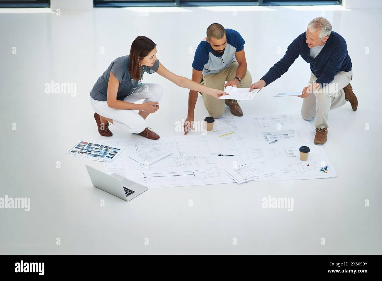 Business people, architect and team with documents for planning ...